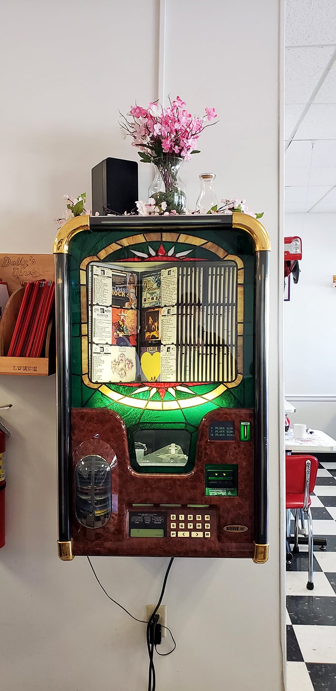 Not just a jukebox, but a time machine—standing ready to transport diners back to simpler times with the push of a button.