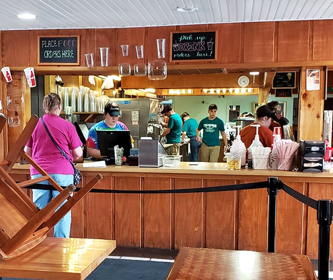 Where the magic begins – friendly faces behind the counter ready to transform your order into edible joy.