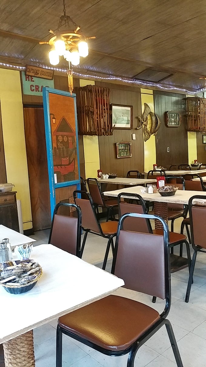 Wood-paneled walls adorned with fishing nets and maritime memorabilia—the restaurant equivalent of your favorite uncle's stories about the sea.