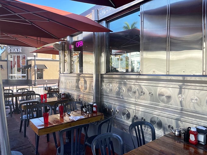 The outdoor patio – where Miami sunshine meets diner classics, and people-watching becomes an Olympic sport.