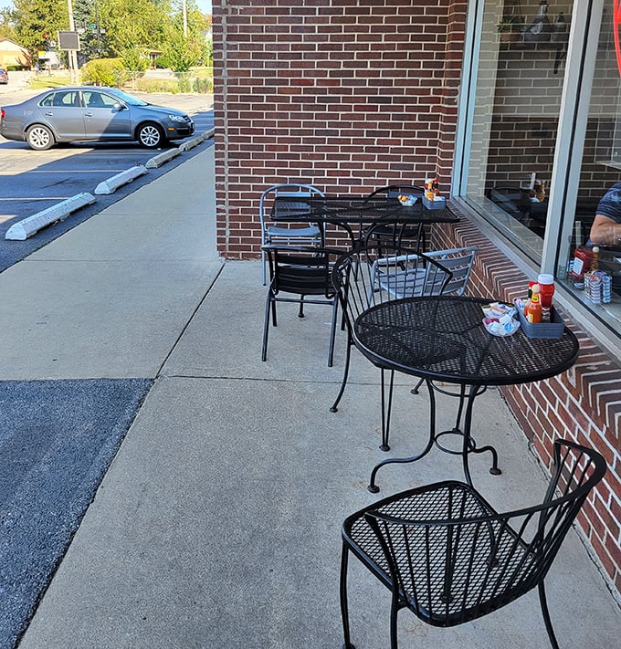 Al fresco dining, diner-style. These sidewalk tables aren't trying to be Parisian—they're pure Lombard, Illinois, where fresh air enhances your breakfast experience.