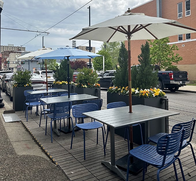 The outdoor patio—where fresh air, people-watching, and burger consumption create the holy trinity of urban dining pleasure.