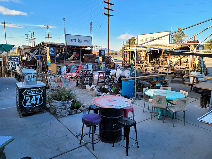 As the desert day winds down, this eclectic outdoor seating area becomes the perfect stage for sunset dining and live music under vast skies.