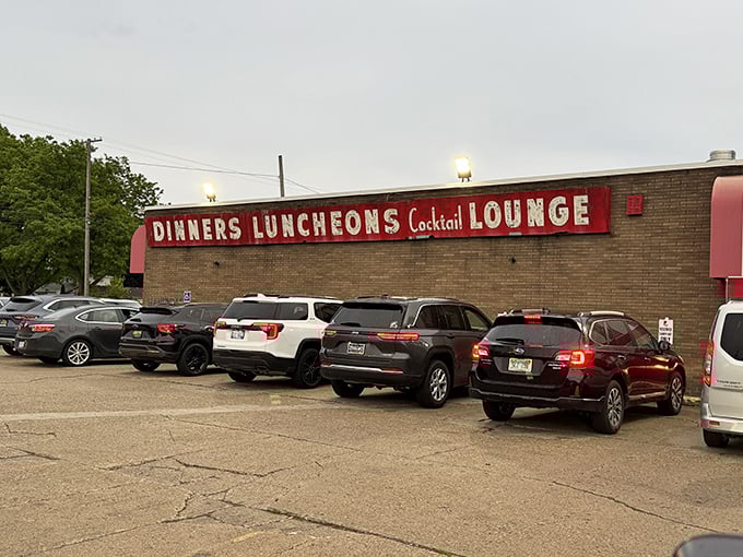 The packed parking lot tells you everything you need to know. In Michigan, we'll brave any weather for pizza this good.