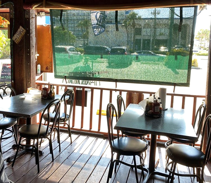 The patio seating offers that perfect Florida indoor-outdoor living where the breeze is free and the people-watching is priceless.