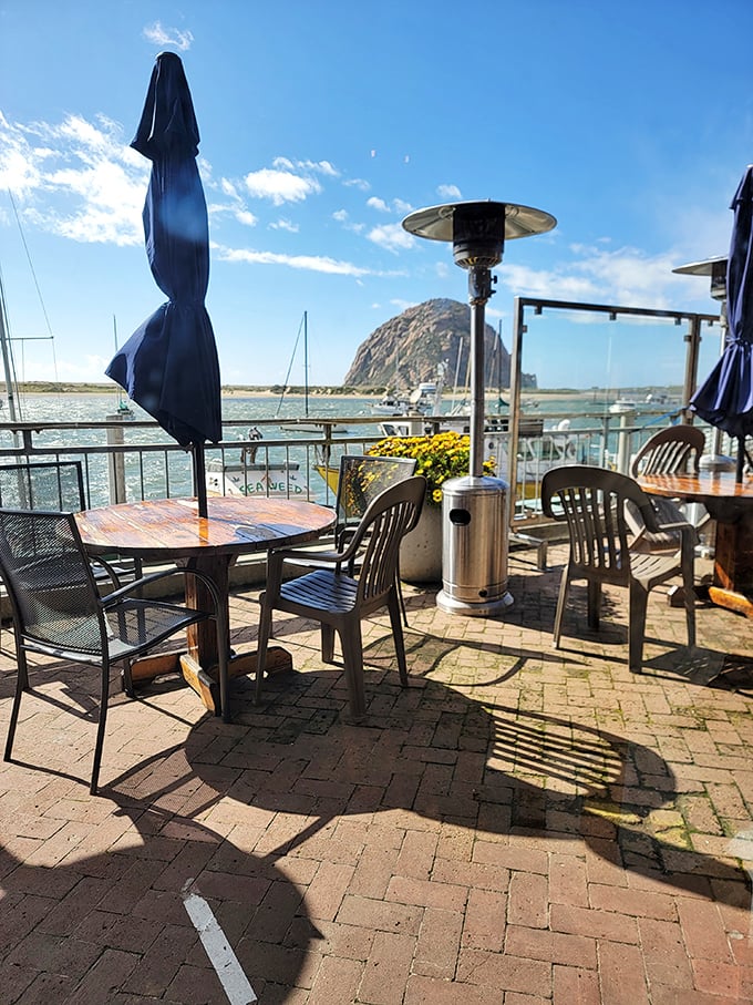 Outdoor seating with Morro Rock standing guard—because fresh seafood tastes even better with a side of iconic scenery.
