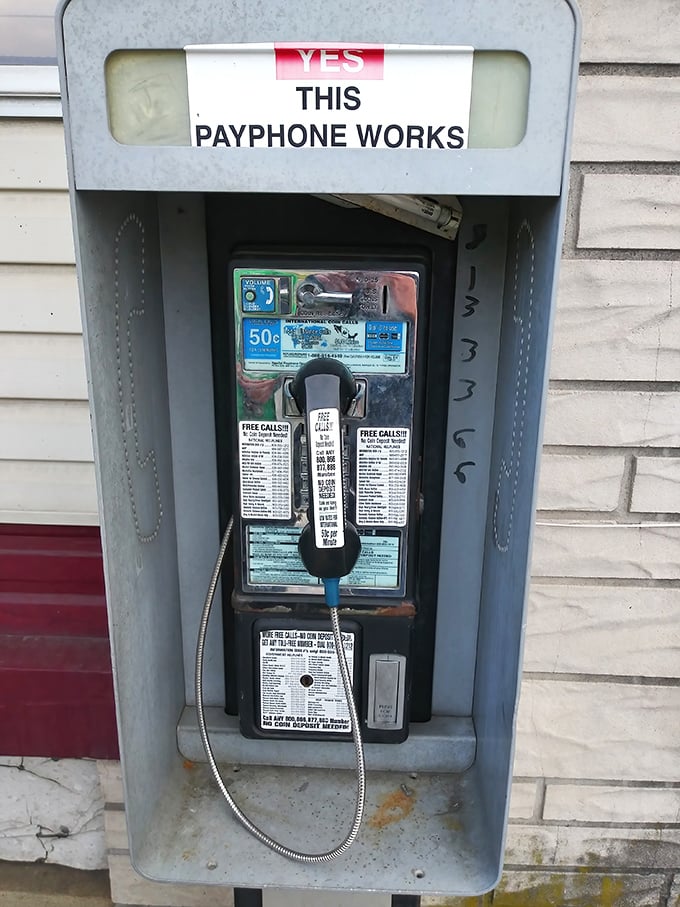Yes, that payphone works—a charming throwback to simpler times, just like the straightforward, delicious food inside.