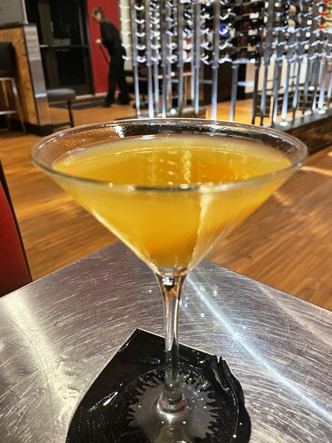 This peach martini glows like a Florida sunset captured in crystal – pure liquid sunshine.