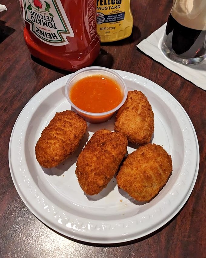 Crispy golden croquettes that deliver that satisfying crunch before revealing their savory interior—the culinary equivalent of a plot twist.