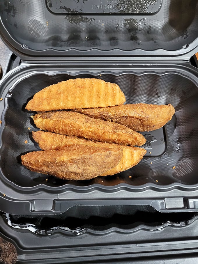 These aren't just chicken strips—they're golden wands of happiness, perfectly seasoned and fried to the exact point where crunch meets tenderness.