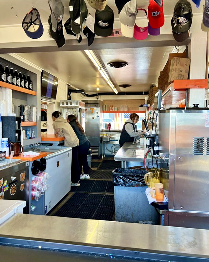Behind the scenes where the magic happens: a compact, efficient workspace where decades of burger-making wisdom gets passed down daily.