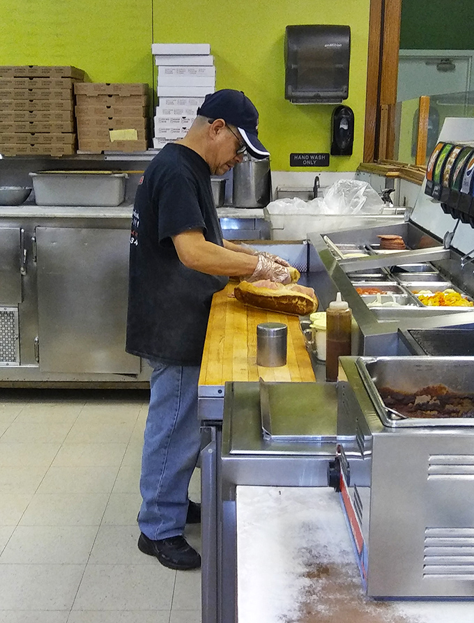 The sandwich assembly station – where every sub is constructed with architectural precision and a generous spirit.