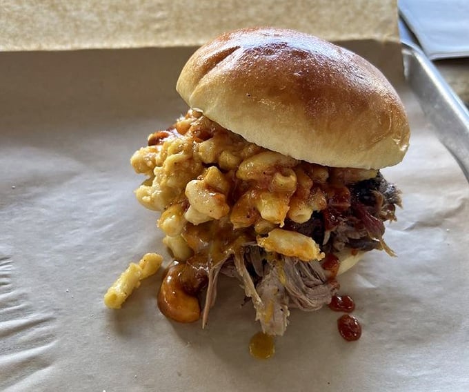 A pulled pork sandwich topped with mac and cheese? It's not just lunch—it's an edible work of art deserving its own exhibition.