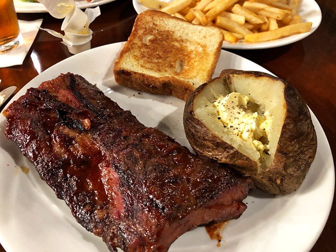 Ribs with a smoke ring that tells tales of patience and expertise. That char speaks a language only true barbecue lovers understand.