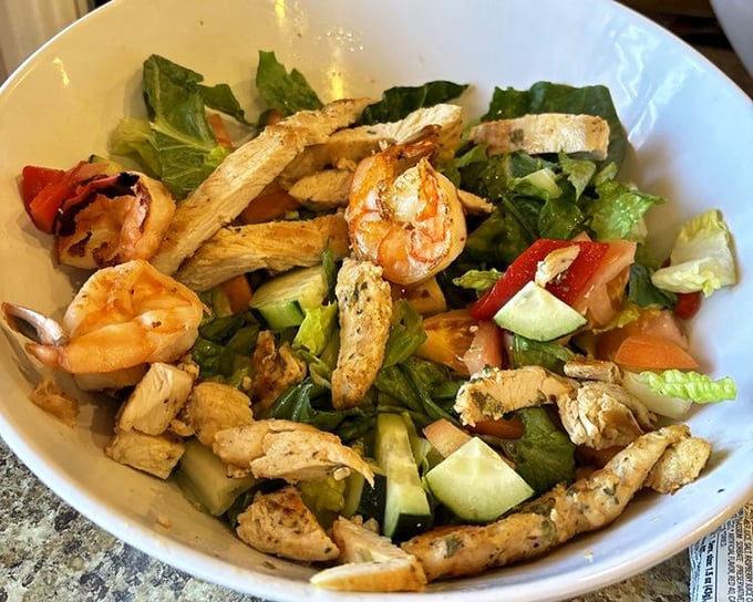 A salad that doesn't apologize for being healthy – bright, fresh, and protein-packed for those rare moments when you're pretending the waffle sundae doesn't exist.