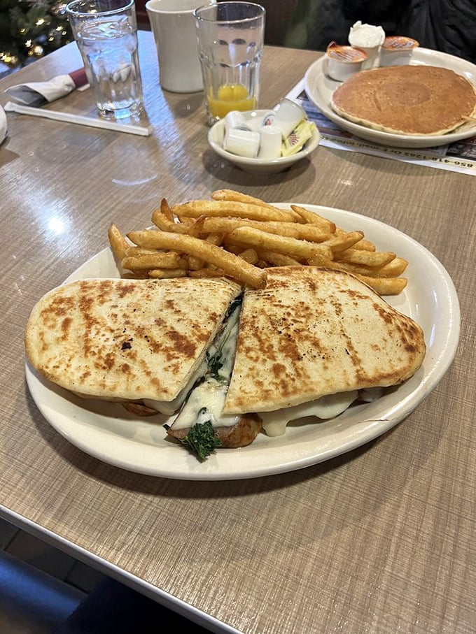 This panini isn't just grilled—it's transformed. The melty interior peeking out is nature's way of saying "good decision, friend."