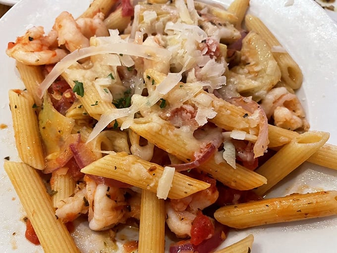 Pasta that doesn't just sit on the plate – it performs. Shrimp and artichokes stealing the spotlight in this Italian ensemble.