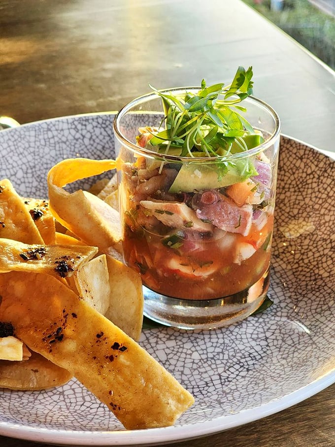 Ceviche in a glass—where seafood gets the spa treatment in citrus juice before making its grand entrance on your palate.