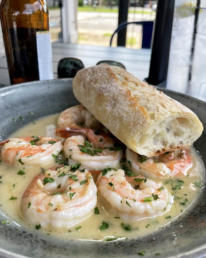 Shrimp scampi that's practically swimming to your mouth. That baguette isn't just bread – it's your ticket to capturing every drop of that heavenly sauce.