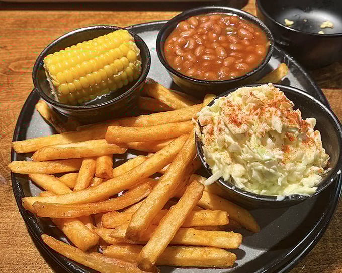 The supporting cast that deserves top billing. Coleslaw, beans, and fries—the barbecue equivalent of Scorsese's reliable character actors.