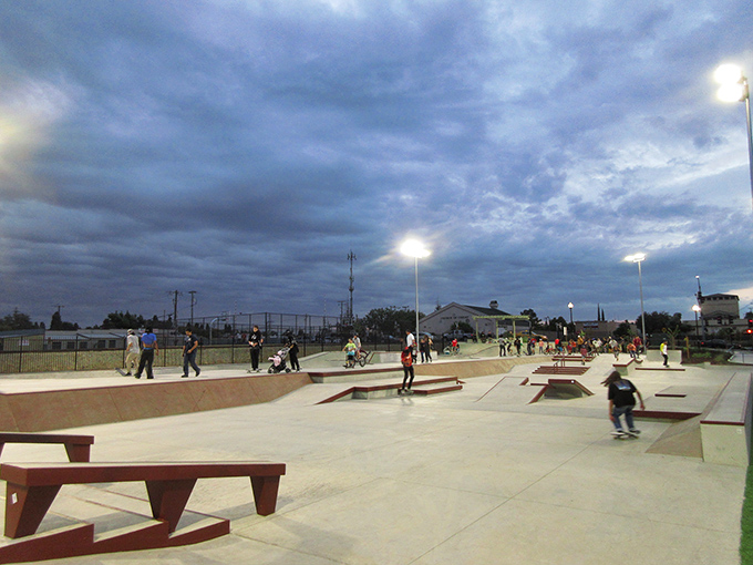 The local skate park lights up as dusk falls, proving Oakdale balances cowboy heritage with modern recreation—Tony Hawk would approve.