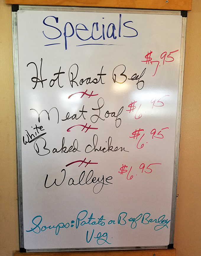 The specials board—where hope is written in dry-erase marker and decisions become significantly more complicated than they were five minutes ago.