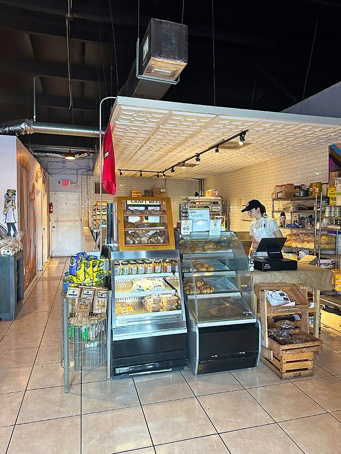 The open kitchen design lets you witness the bread ballet—where flour, water, and time transform into something worth driving across state lines for.