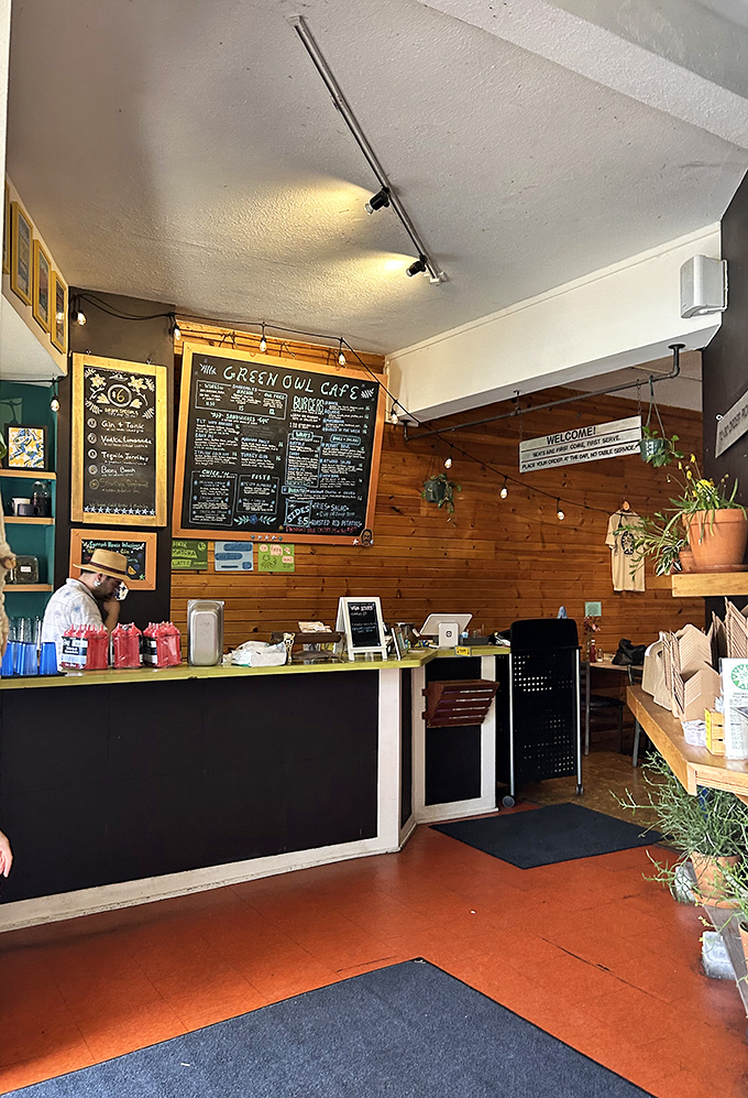 Behind the counter, where plant-based magic happens daily, surrounded by the tools of the vegetarian trade.