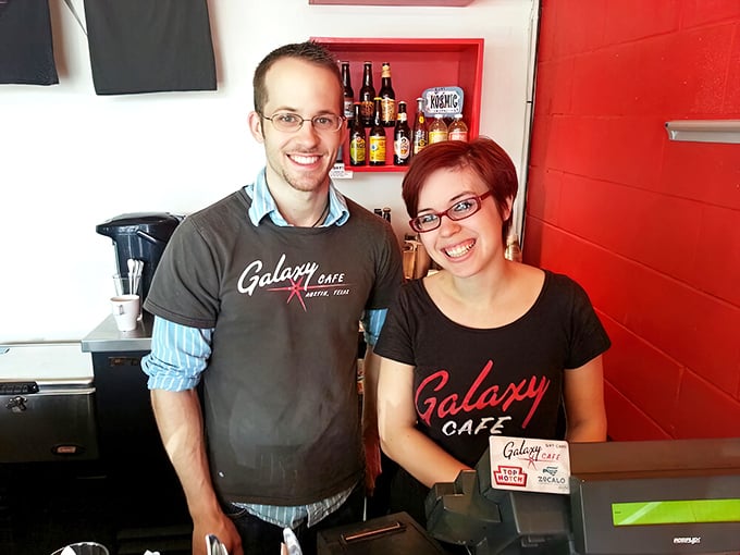 The smiles say it all—Galaxy Cafe staff who look genuinely happy to be there. The secret ingredient in every good meal. 