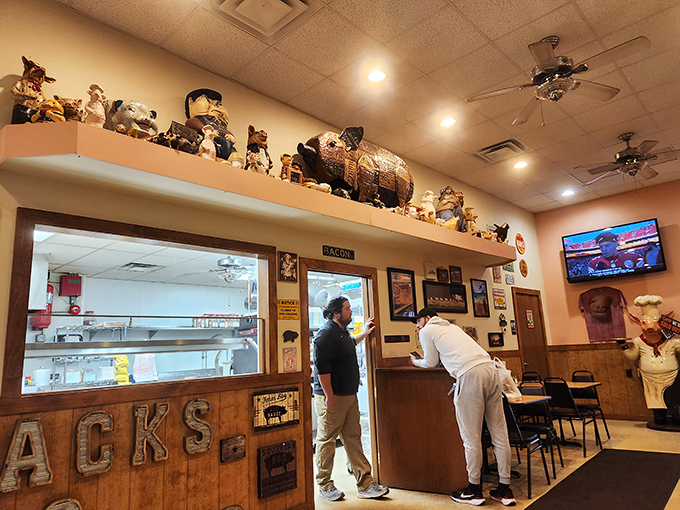 The sacred exchange—order at the counter, receive smoky treasures in return. This moment of anticipation is almost as good as the first bite.