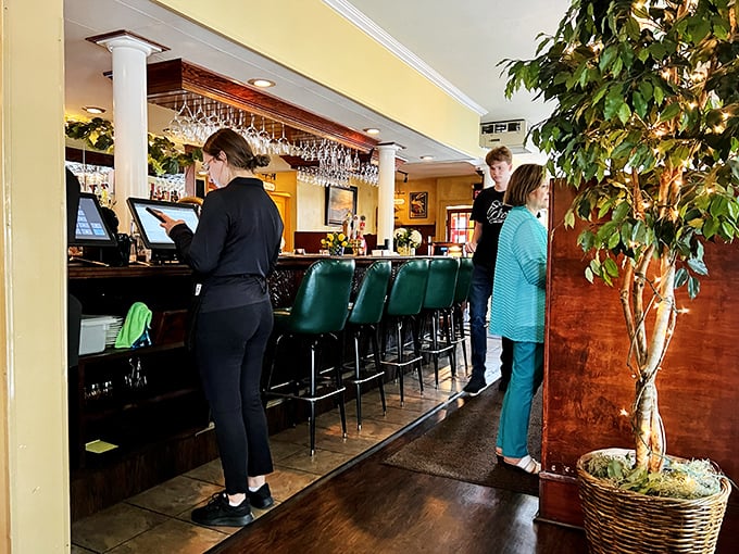 The staff moves with practiced efficiency—the choreography of hospitality perfected through years of serving hungry Pennsylvanians.