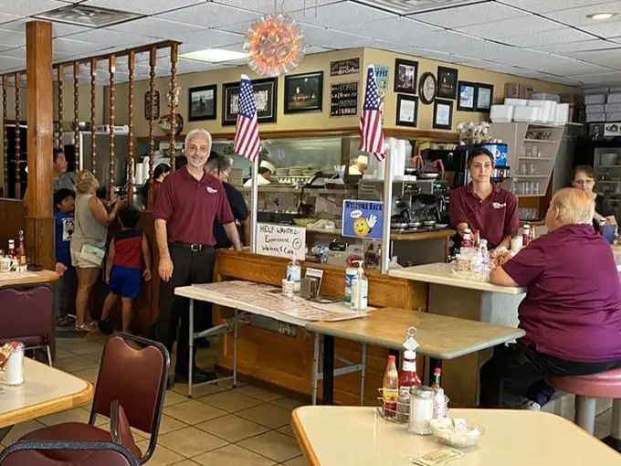 The staff at Ray's doesn't just serve food—they're curators of community, wearing their diner pride like a well-earned badge.