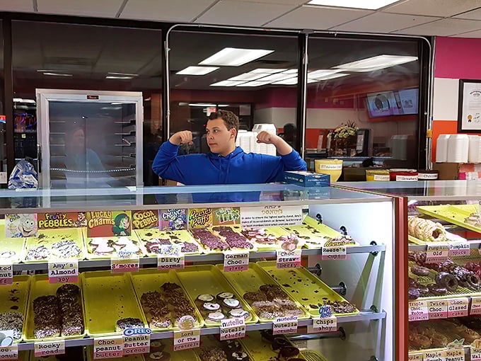 The maestro at work – flexing those donut muscles to bring you another batch of perfection.
