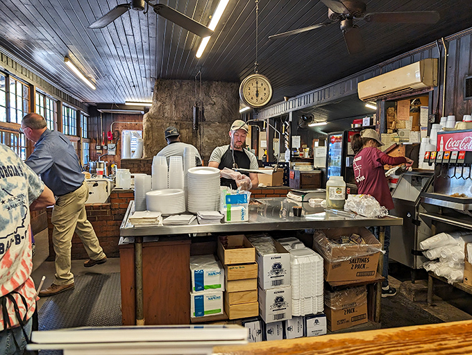 The choreography of service: Staff moving with practiced efficiency, turning hungry customers into happy evangelists one plate at a time.