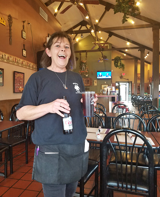 The staff doesn't just serve food—they deliver joy with a side of sass. That smile says, "Yes, we can absolutely bring you more bacon."