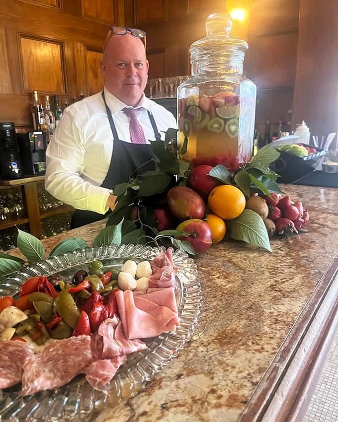 The antipasto platter and fruit-infused water – a colorful prelude to the symphony of flavors that awaits lucky diners.