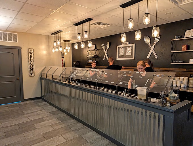 Modern touches blend seamlessly with supper club tradition at the service counter, where generations of diners have started their culinary journeys.