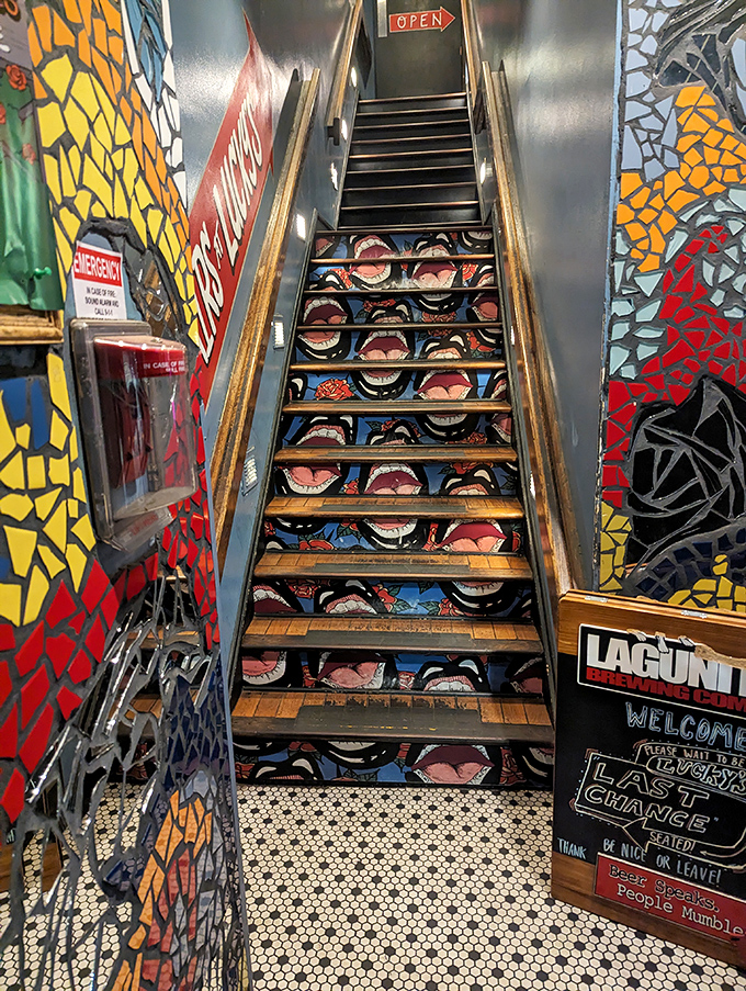 Even the staircase is a work of art, decorated with faces that seem to welcome you.