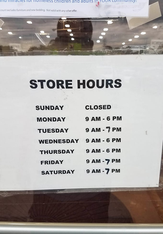 The store hours sign—memorize it like your favorite recipe to ensure you never miss prime thrifting opportunities.