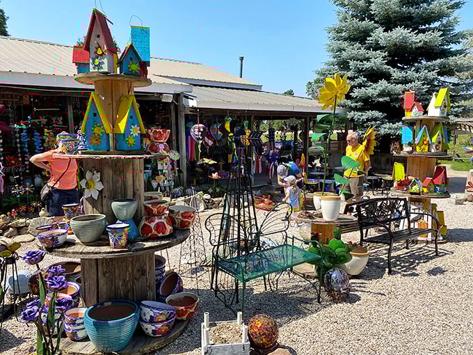Garden art and colorful pottery displayed outdoors—because in Petoskey, even shopping breaks include fresh air and inspiration.