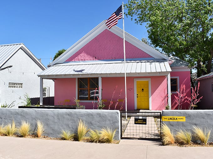 The Lincoln's bubblegum-pink exterior and sunny yellow door announce that this is no ordinary small-town establishment—it's Marfa, after all.