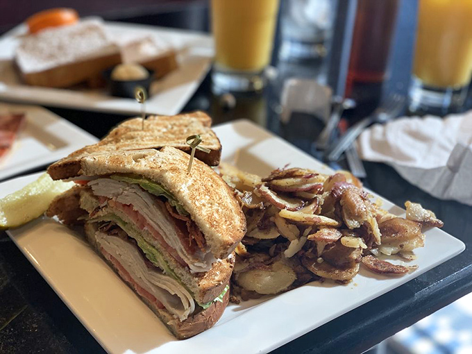 This isn't just a sandwich—it's architecture with turkey. The home fries on the side are no afterthought either.