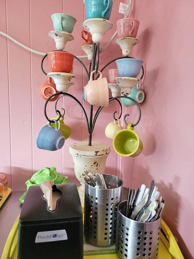 The coffee cup tree: where ceramic meets whimsy. Like a Dr. Seuss illustration come to life in the corner of this pink-walled Polish paradise.