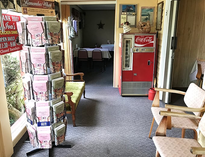 The waiting area features the ultimate tease: a vintage Coca-Cola machine and glimpses of the dining room beyond. Anticipation has never been so delicious.