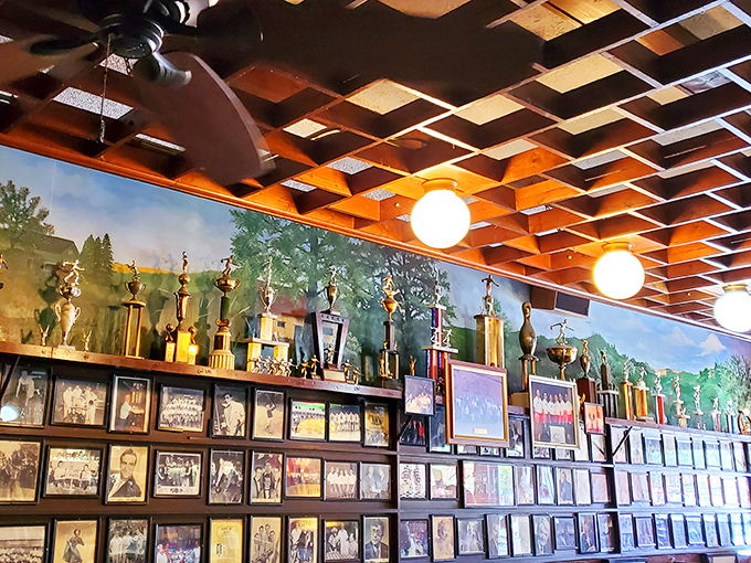 Decades of community memories line the walls—trophies and photographs telling the story of a restaurant that's more than just a place to eat.