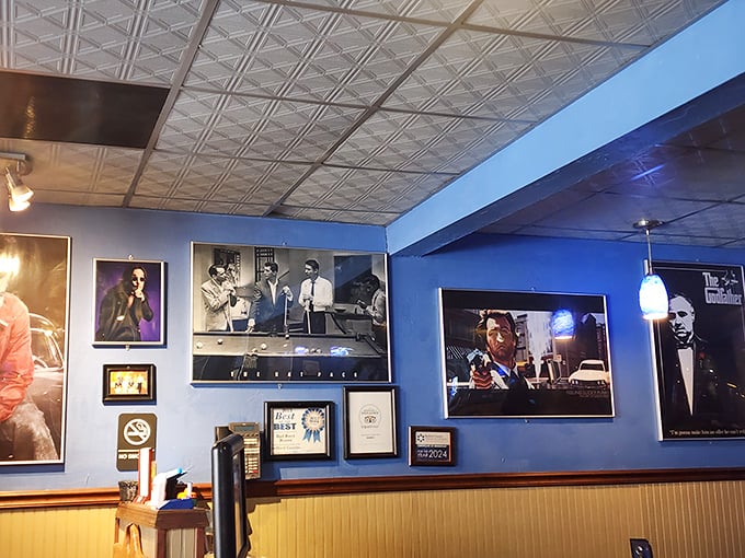 Wall art featuring cinematic legends watching over your meal. Dining under Godfather's gaze adds a certain gravitas to ordering extra ranch dressing.