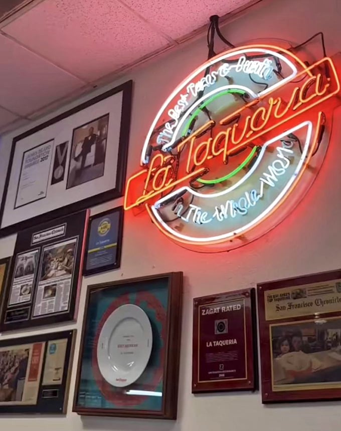 The wall of accolades and neon signage tells the story that locals already know: this place isn't famous by accident.