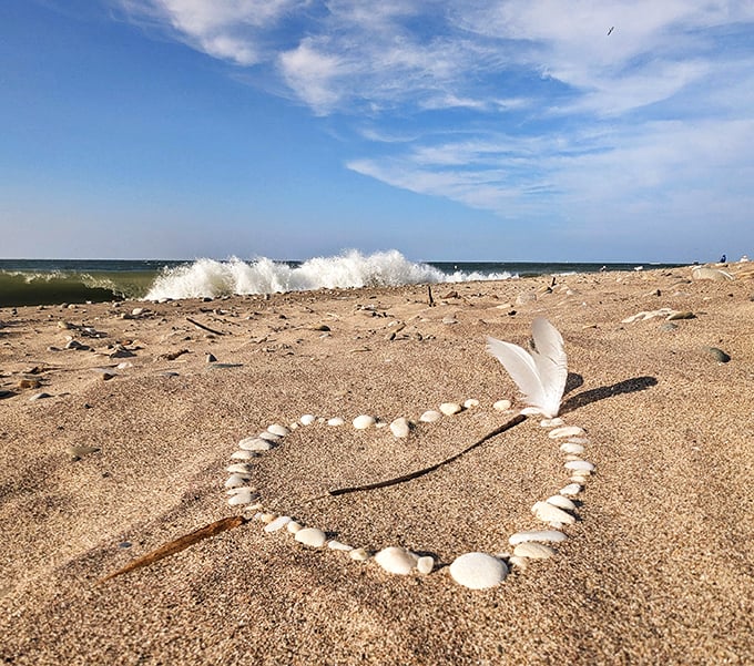 Mother Nature's perfect wave crashes onto shore, leaving behind a heart made of shells—even the lake knows this place is lovable.