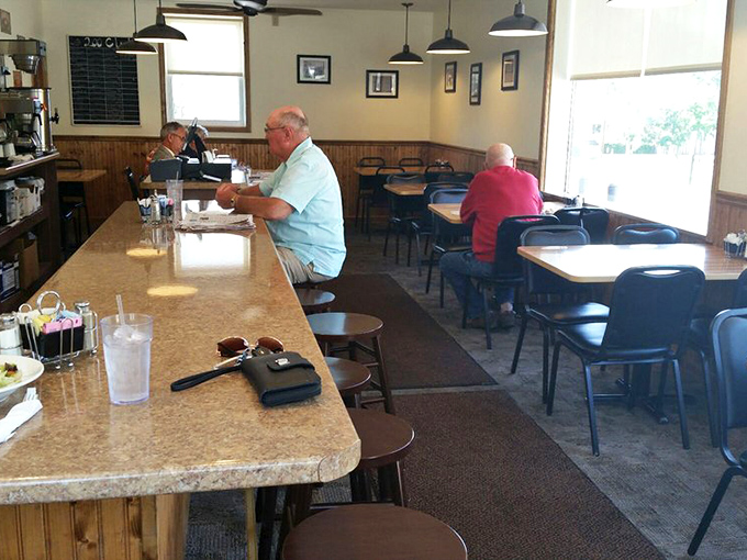 The quiet corner where regulars solve the world's problems over coffee and where first-timers become converts to the Church of Comfort Food.