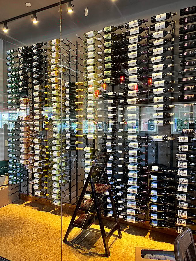 A wine wall that would make Bacchus himself weep with joy—because even gods know good barbecue deserves proper liquid accompaniment.